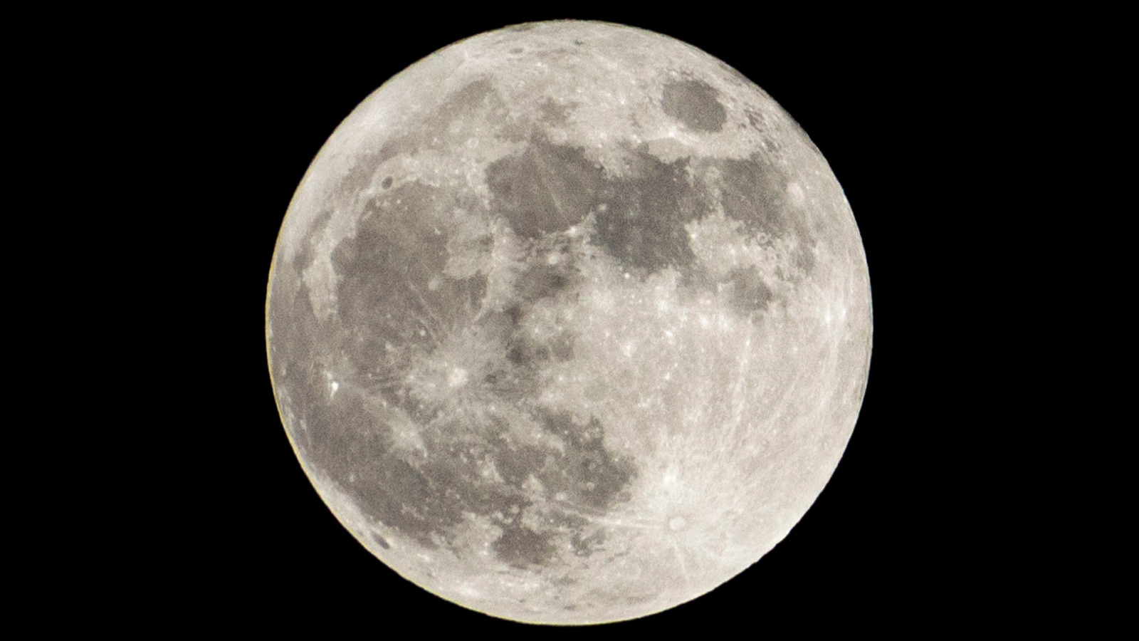 What Are The Marks On The Moon That Make It Look Like Swiss Cheese?